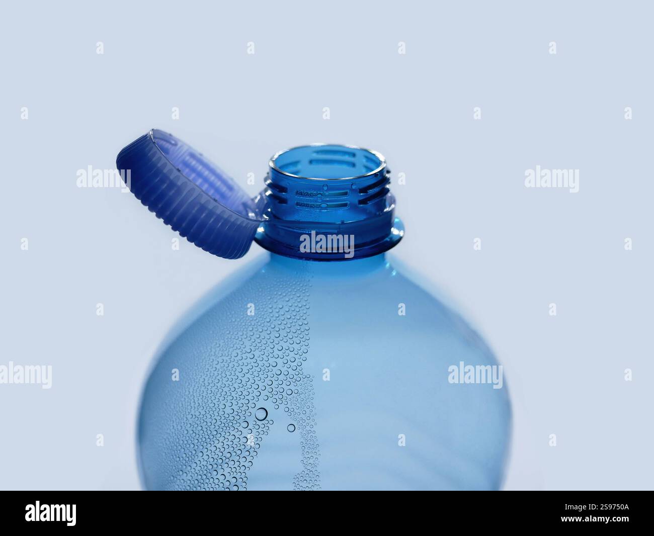 A new mechanism of plastic bottle with a stationary fixed tethered cap ...