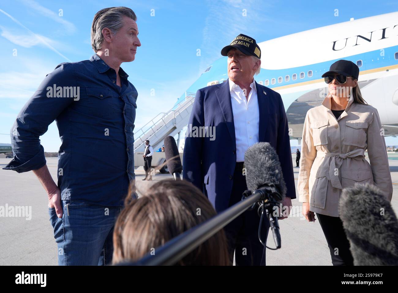 President Donald Trump speaks as first lady Melania Trump and ...