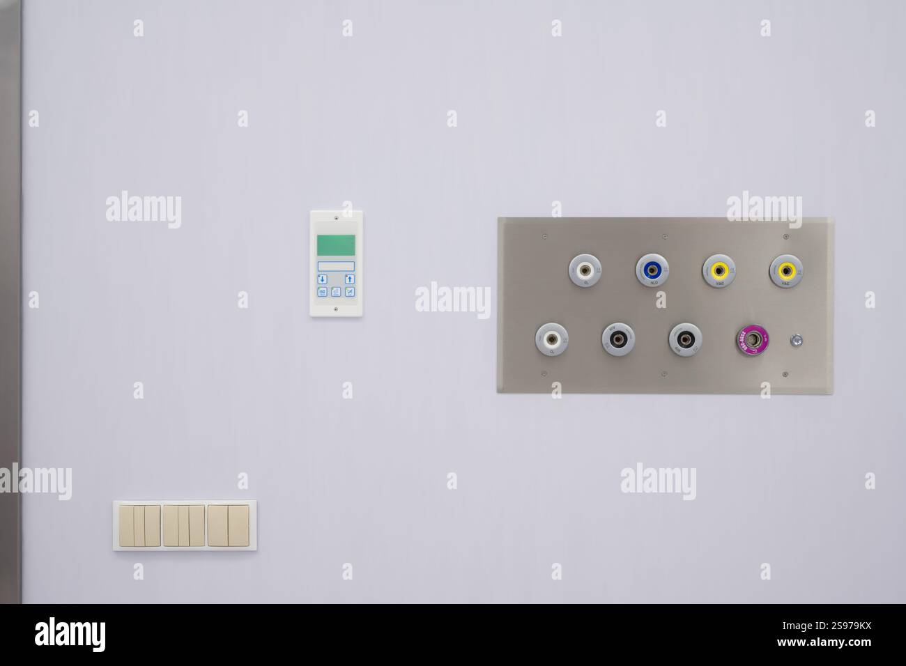 Medical Gas Outlets, Control Panel, and Switches on a White Wall Stock ...