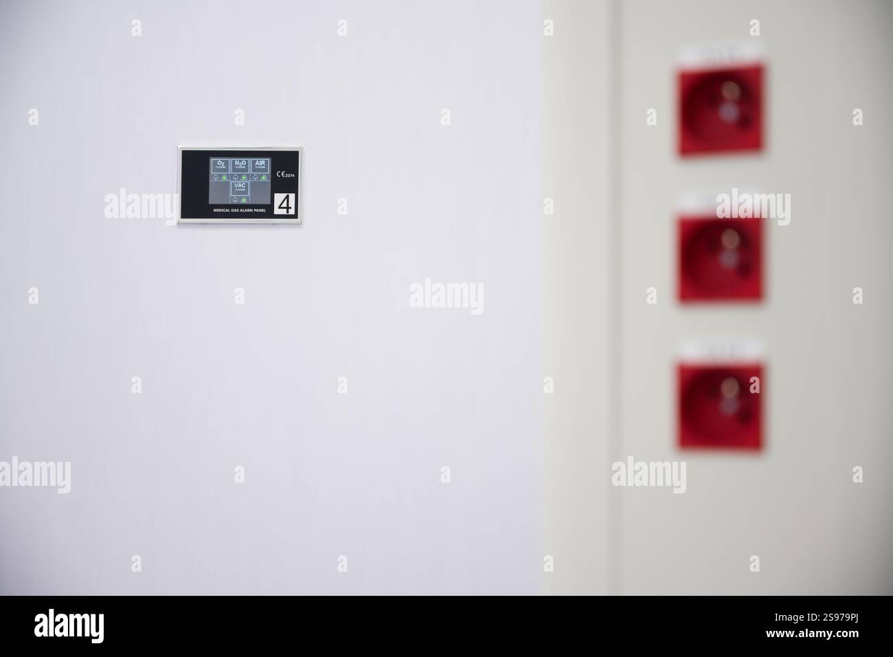 Medical Alarm Panel and Electrical Outlets on a White Wall Stock Photo ...