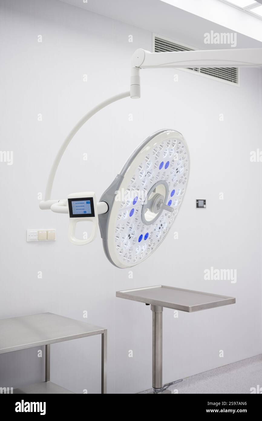 Modern Surgical Light and Tables in Medical Facility Stock Photo - Alamy
