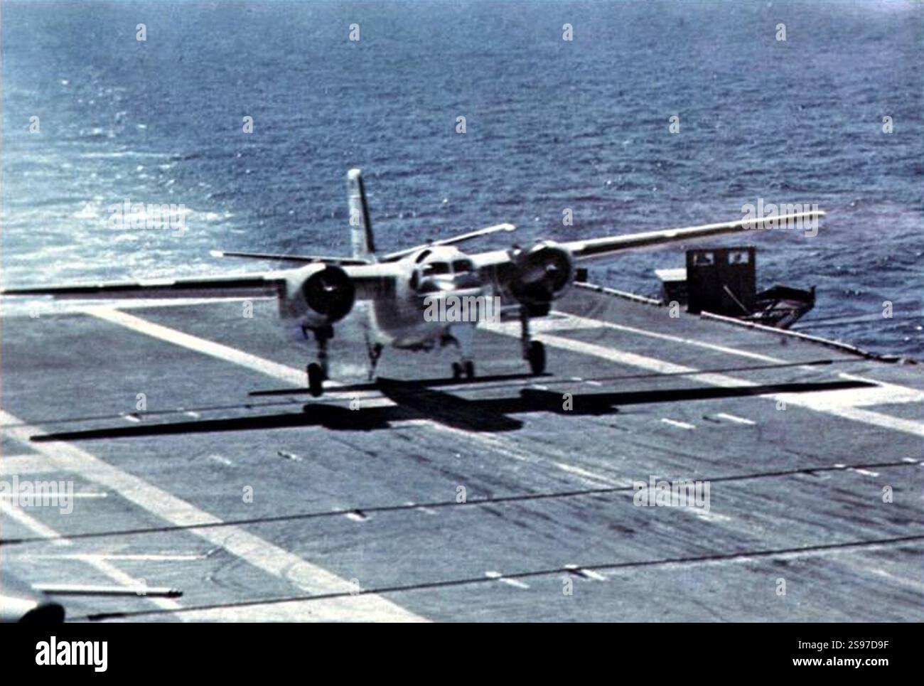 Grumman C-1A Trader landing aboard USS Oriskany (CVA-34), circa in 1974 ...