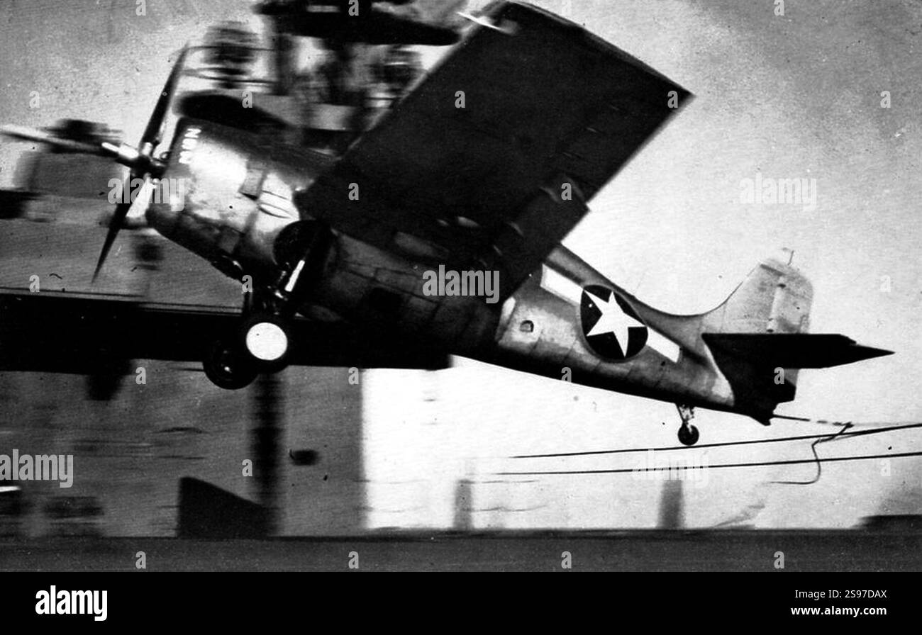 Grumman F4F-4 Wildcat landing aboard USS Tripoli (CVE-64), circa in ...