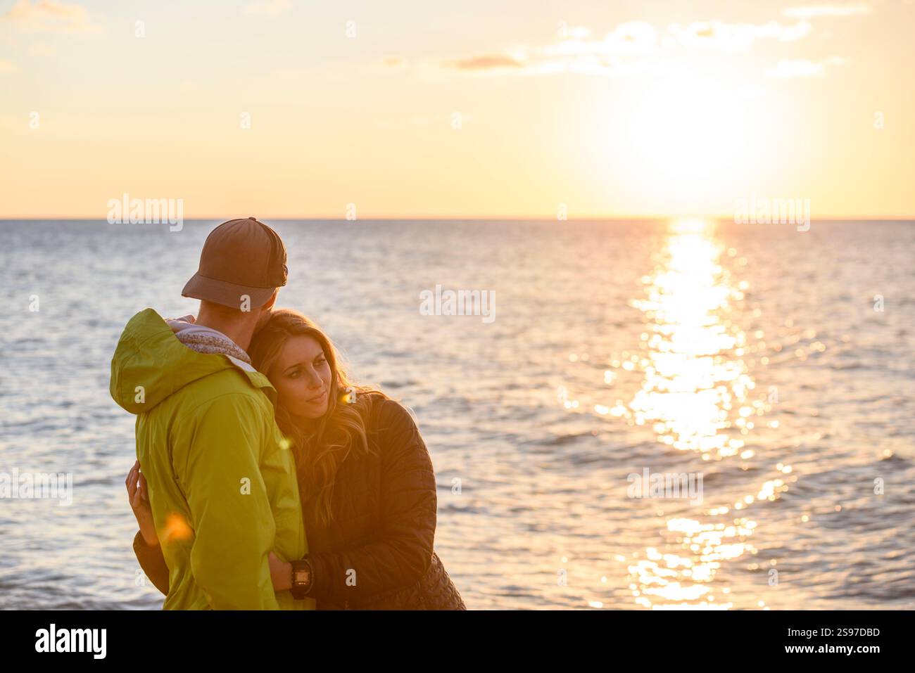 Affectionate couple beach hi-res stock photography and images - Alamy