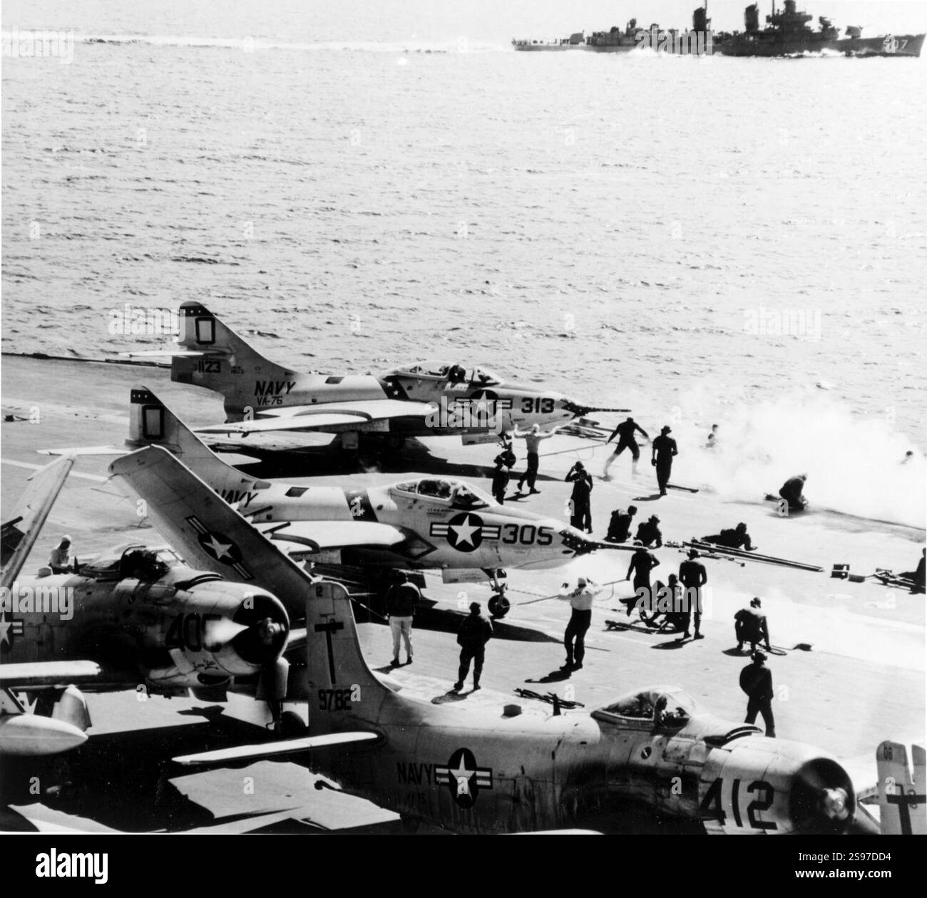 Grumman F-8F-8B Cougars of VA-76 and Douglas AD-6 Skyraiders of VA-15 ...