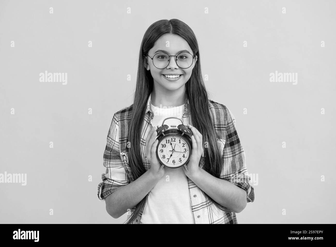 school time. Teen girl checking the clock. time schedule. Time ...