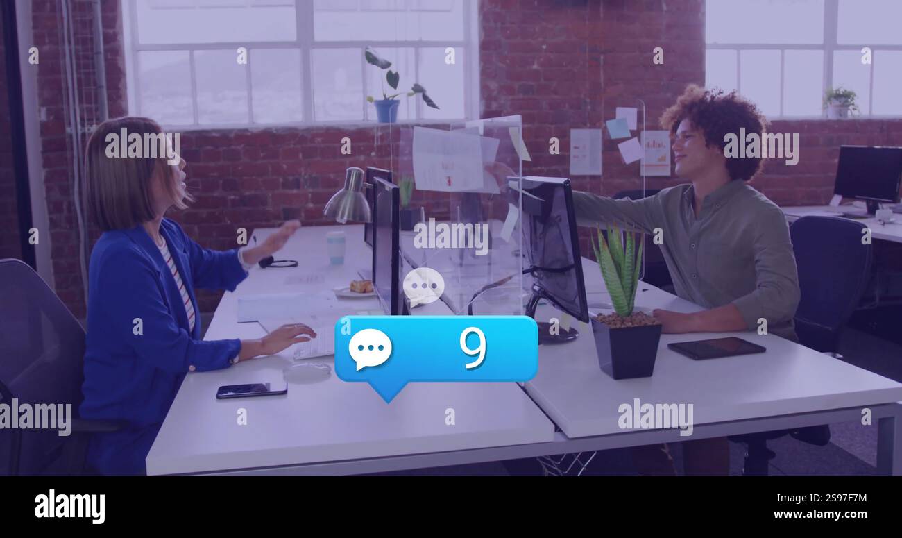 Image of media icons over diverse colleagues talking in office Stock ...