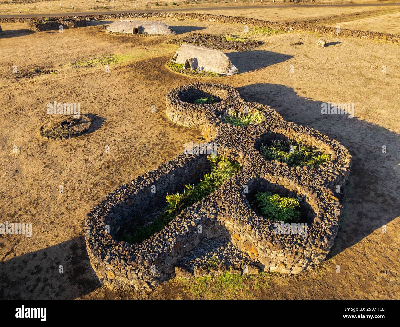Hare Paenga reconstructed traditional thatched boat shaped houses and ...