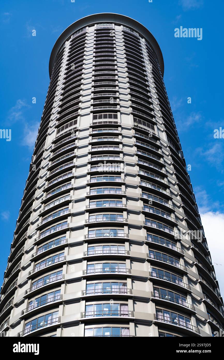 Tower building with skyscraper architecture. Skyscraper hotel in shape ...