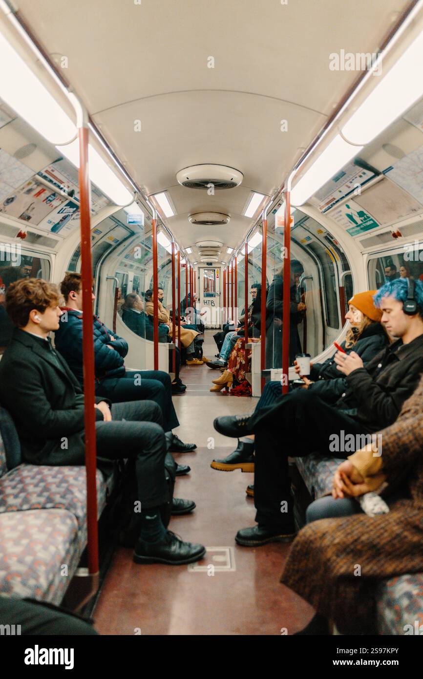 Commuters on a Modern Underground Train During a Busy Journey Stock ...