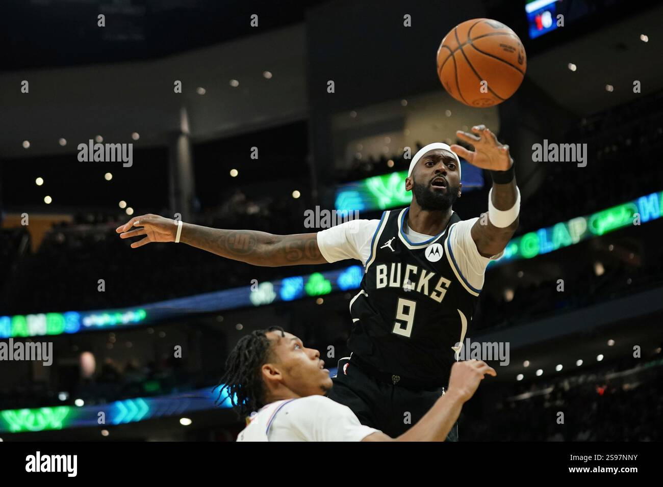 Milwaukee Bucks' Bobby Portis (9) loses control of the ball against ...