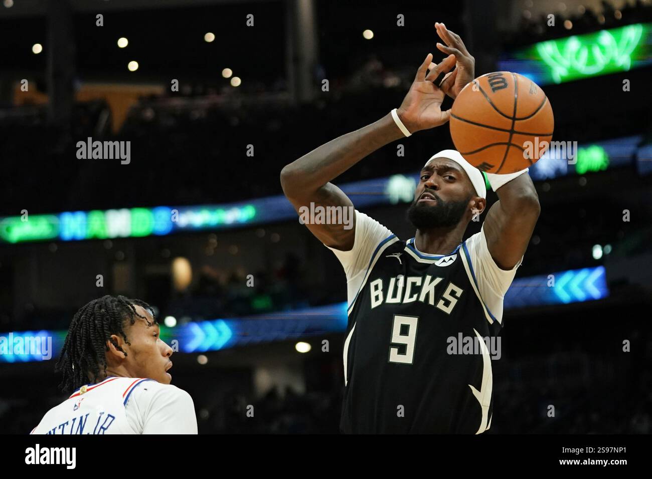 Milwaukee Bucks' Bobby Portis (9) loses control of the ball against ...