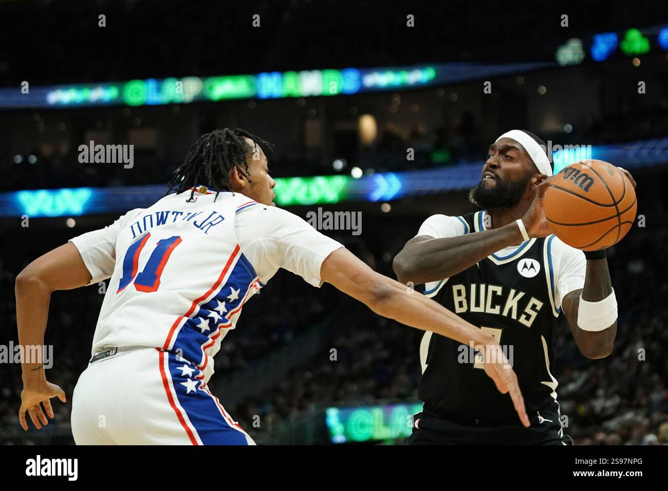 Milwaukee Bucks' Bobby Portis (9) loses control of the ball against ...