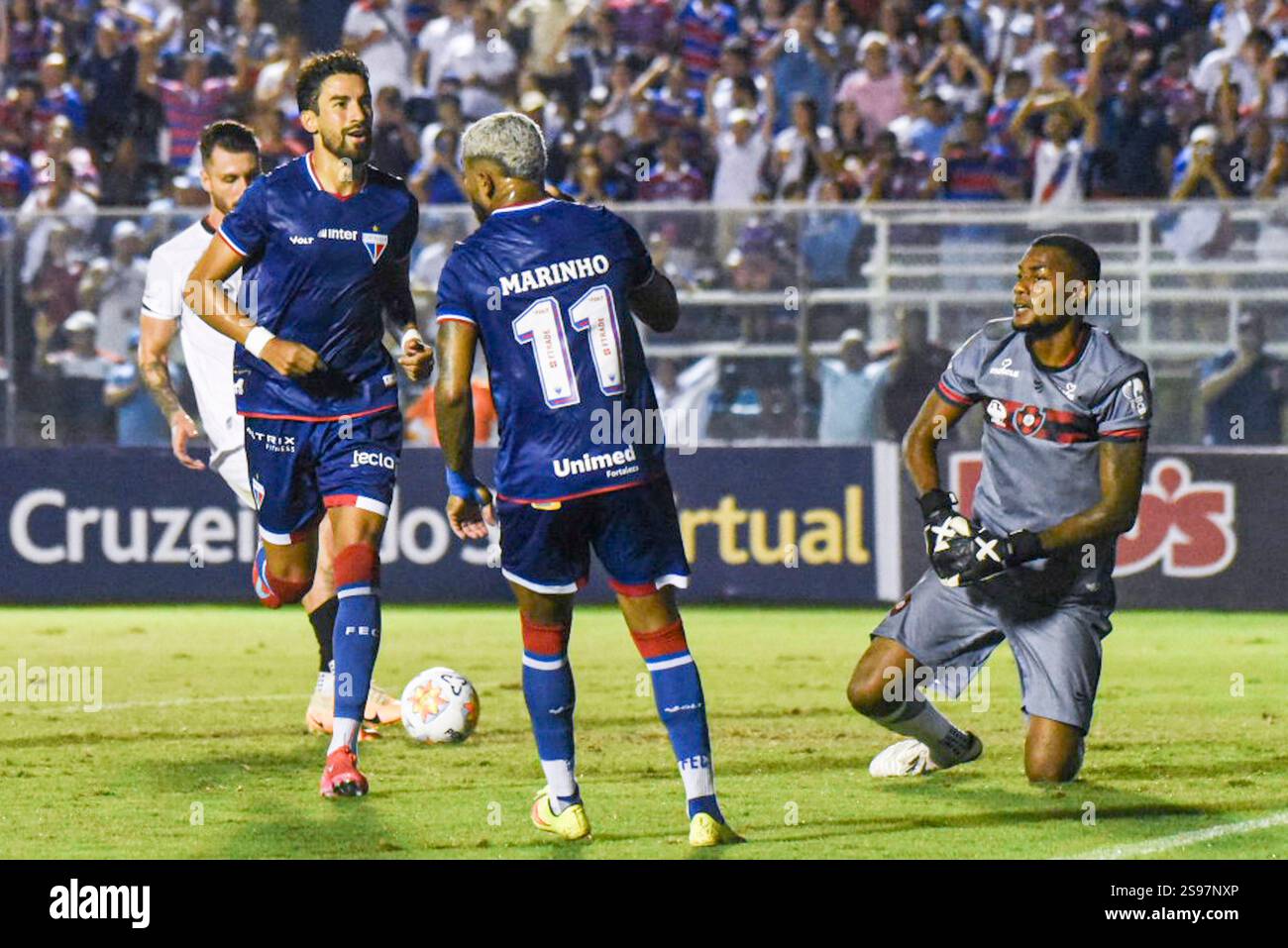 Juan Martín Lucero of Fortaleza celebrates after scoring a goal during ...