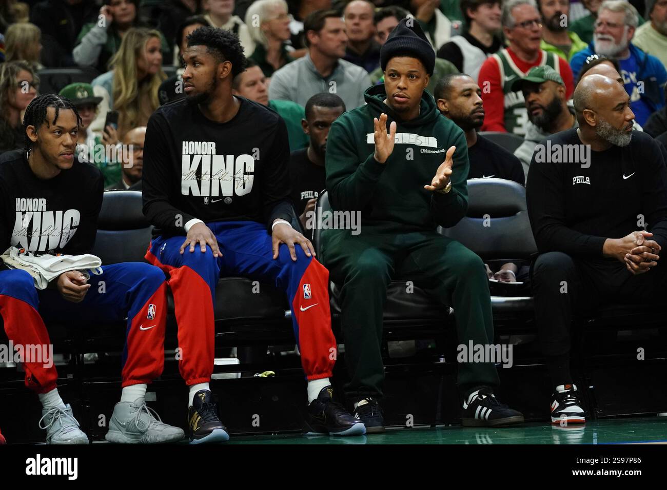 Philadelphia 76ers' Kyle Lowry, right, claps as he watches from the ...