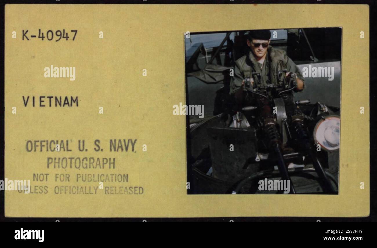 Gunner mans the twin .50 cal machine guns on a PBR Stock Photo - Alamy