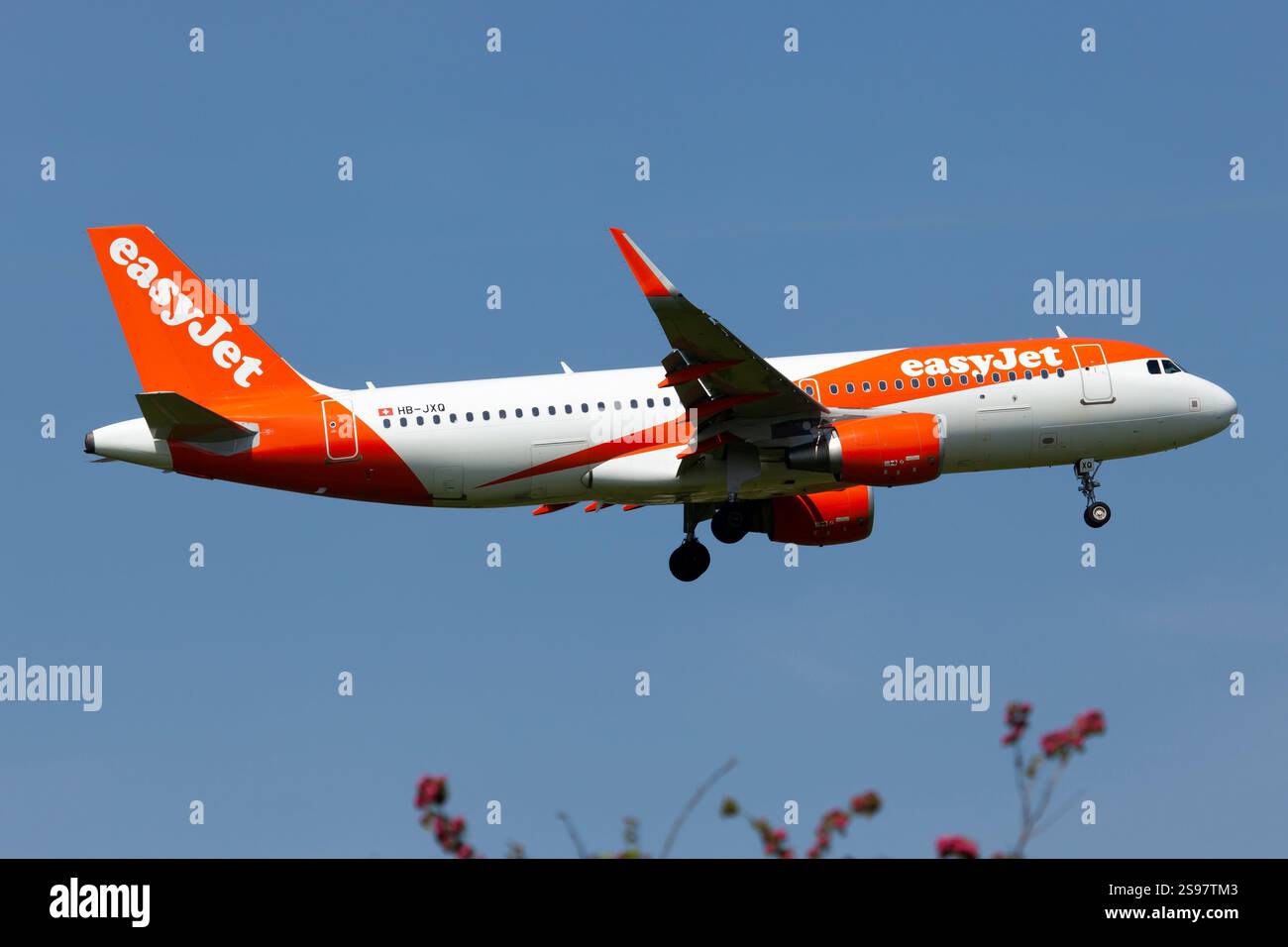An easyJet Switzerland Airbus 320 landing at Barcelona El Prat airport. easyJet Switzerland ...