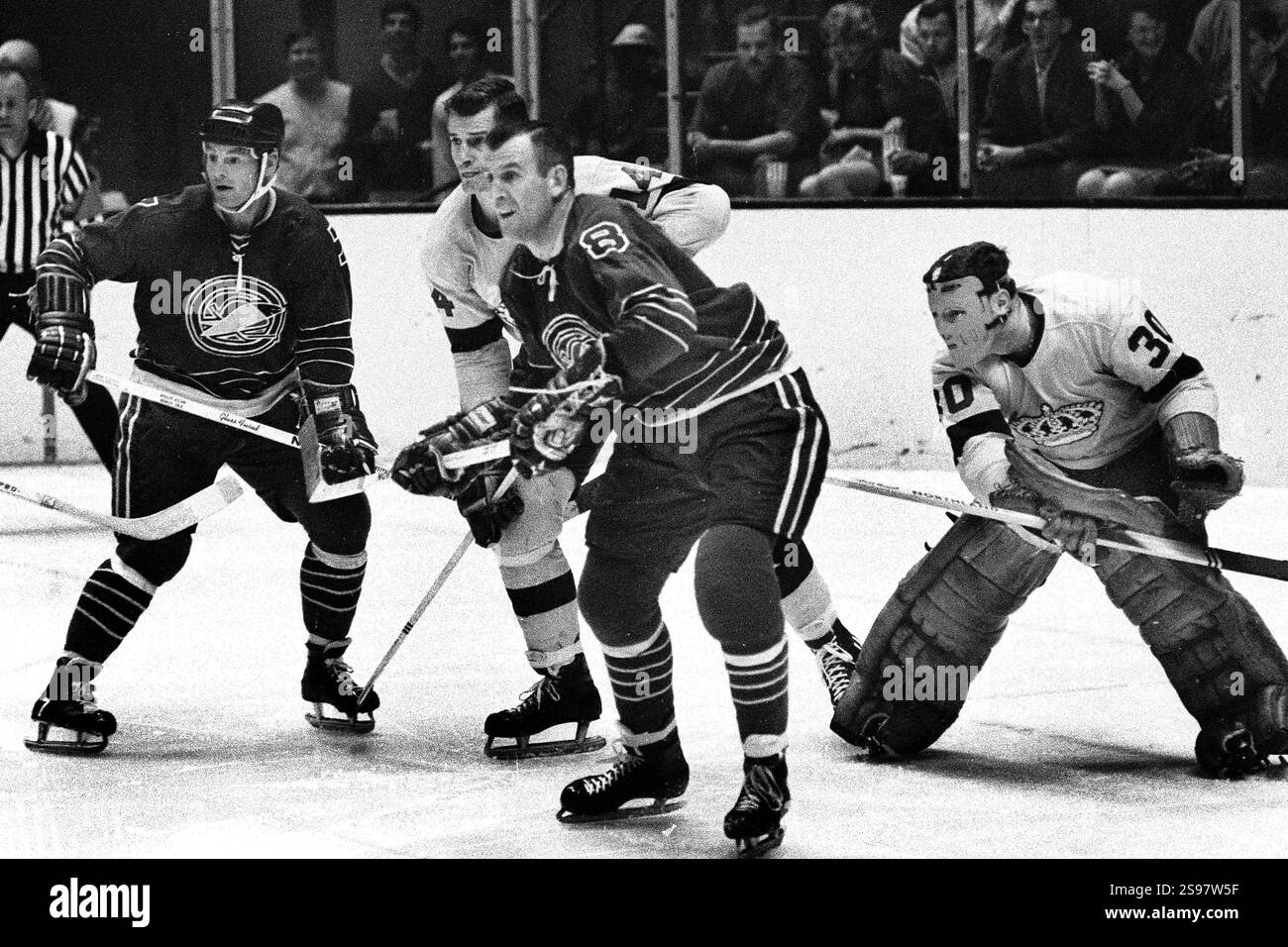 Oakland Seals Billy Harris and Gerry Ehman (8) defended by Los Angles ...