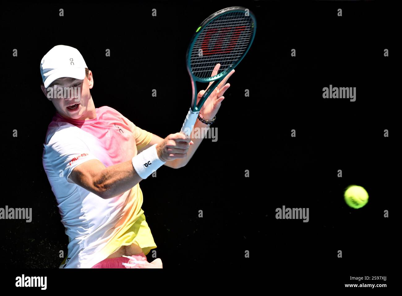 Henry Bernet of Switzerland returns during his Junior Boys Singles ...