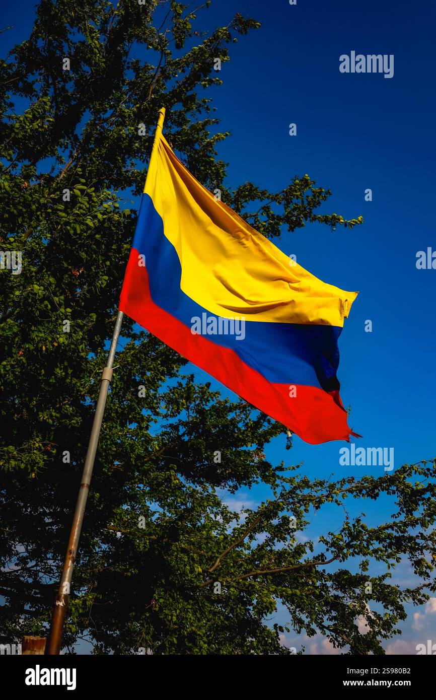 Blue sky background with colombia flag hi-res stock photography and ...