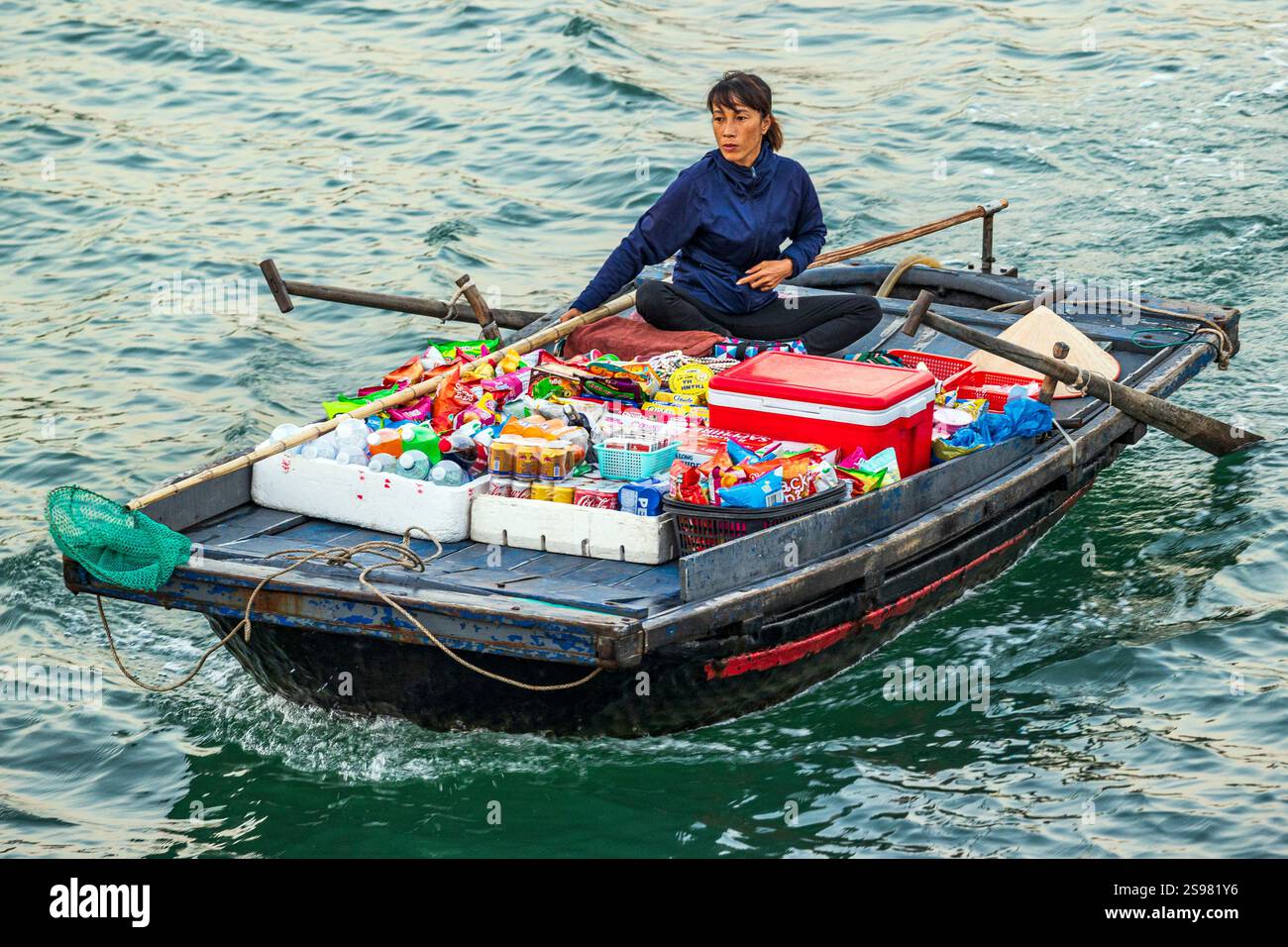 Person rowing boat goods in hi-res stock photography and images - Alamy