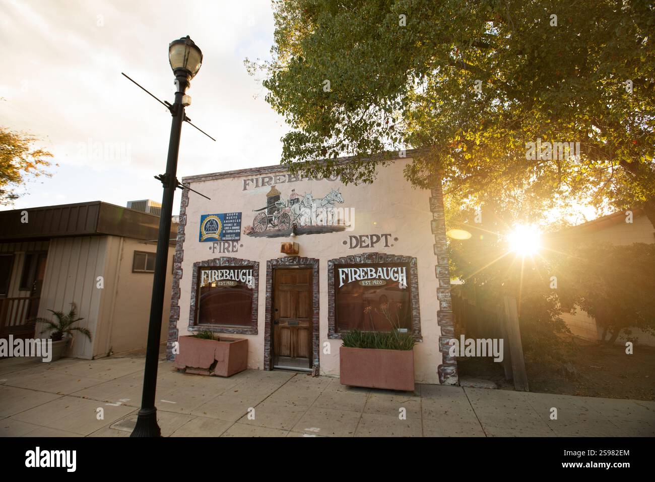Firebaugh, California, USA - October 28, 2024: The setting sun shines ...