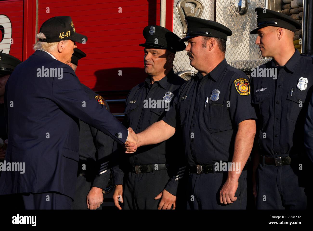President Donald Trump greets Los Angeles firefighters during a tour ...