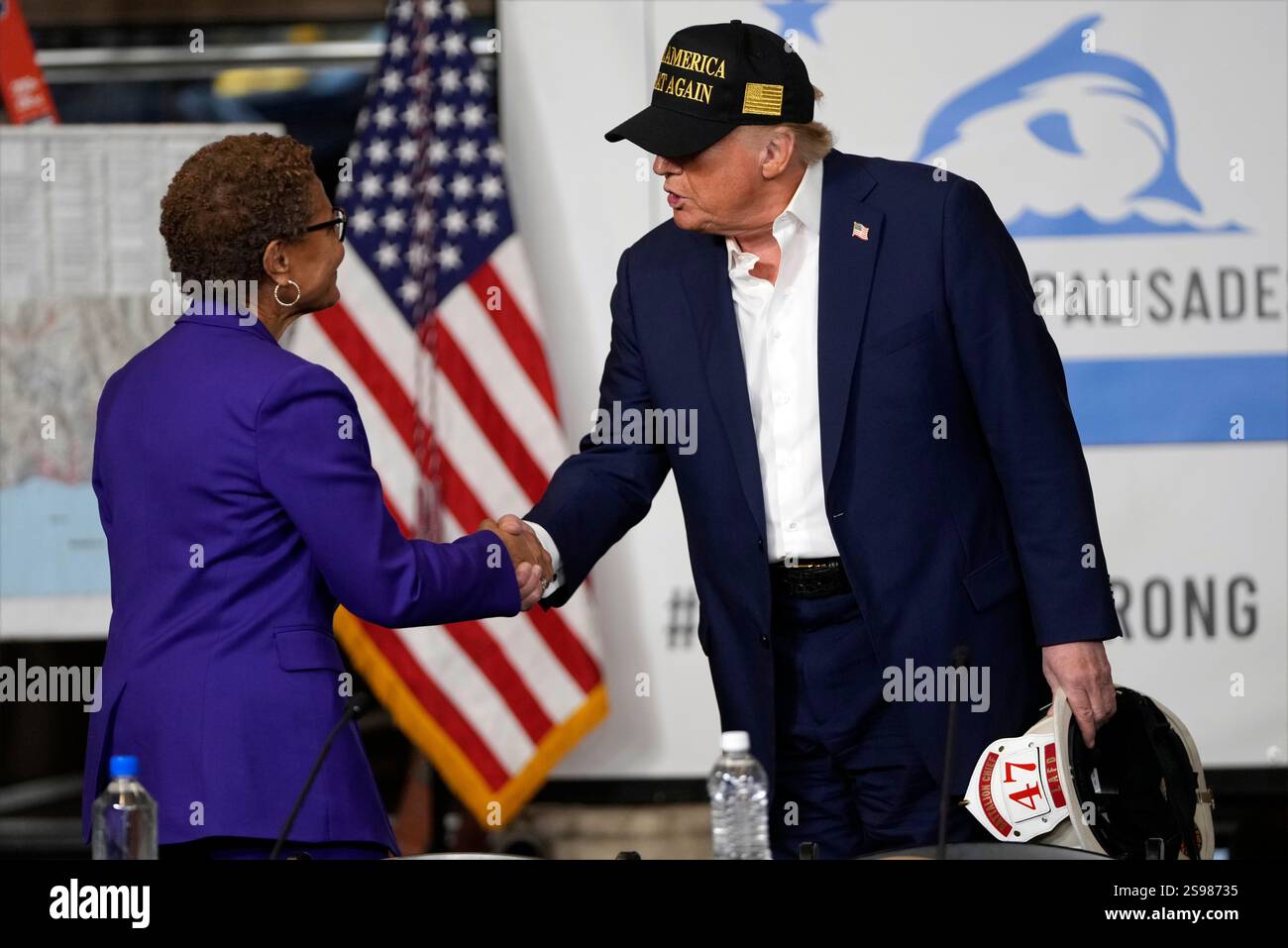 President Donald Trump shakes hands with Los Angeles Mayor Karen Bass ...