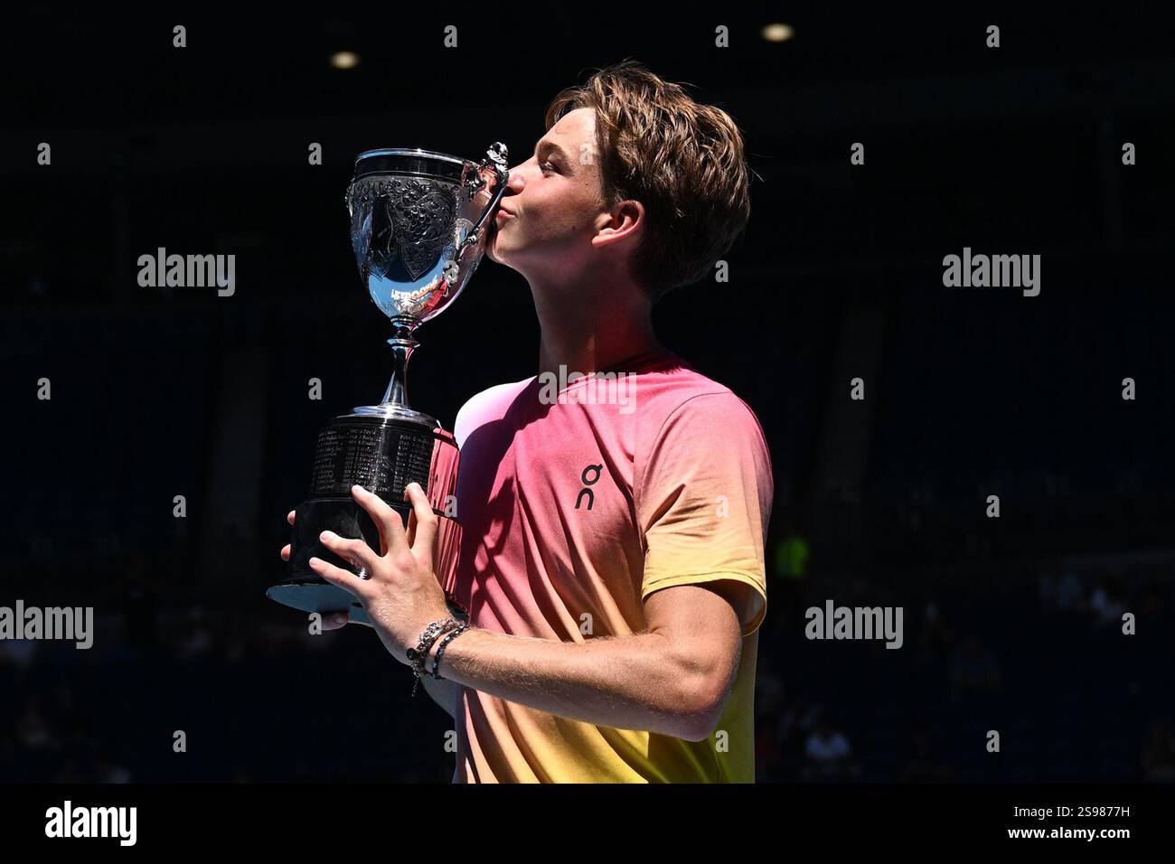 Henry Bernet of Switzerland kisses the winners trophy following his ...