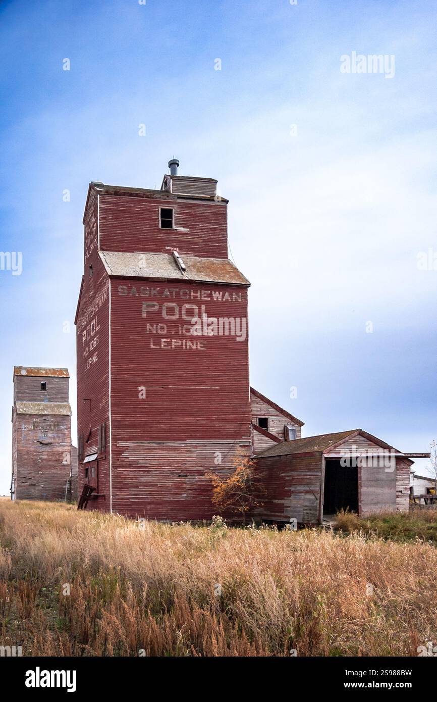 A red grain silo with the words "S. Pool" on it. The silo is surrounded ...