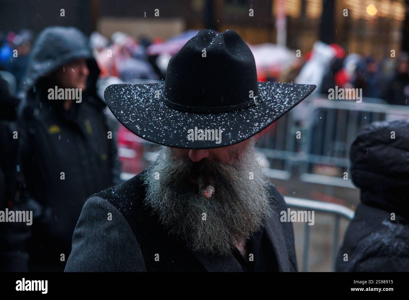 January 19, 2025 - Washington, District of Columbia USA: A man smokes a ...