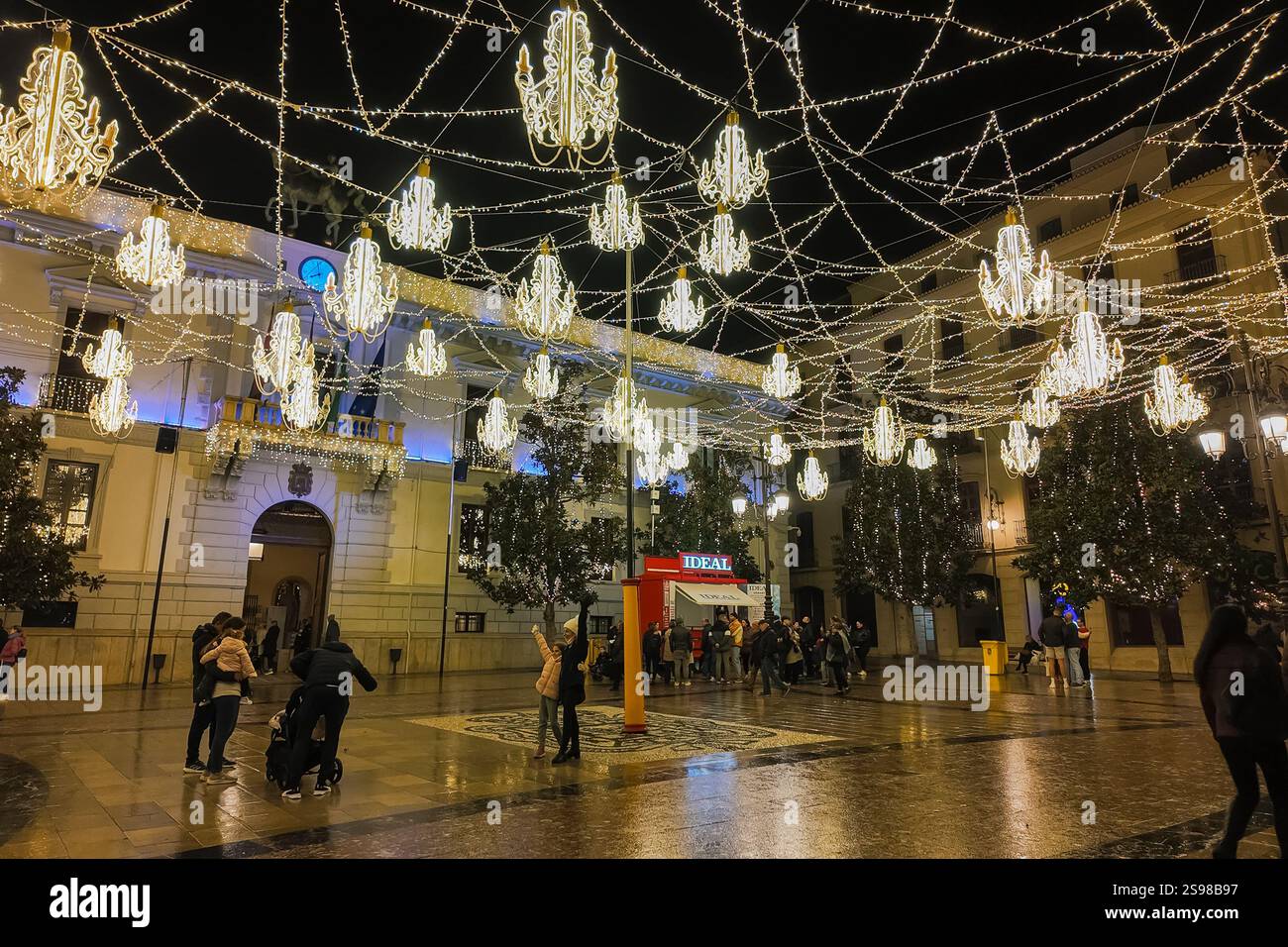 Granada at night during the Christmas season features streets filled ...