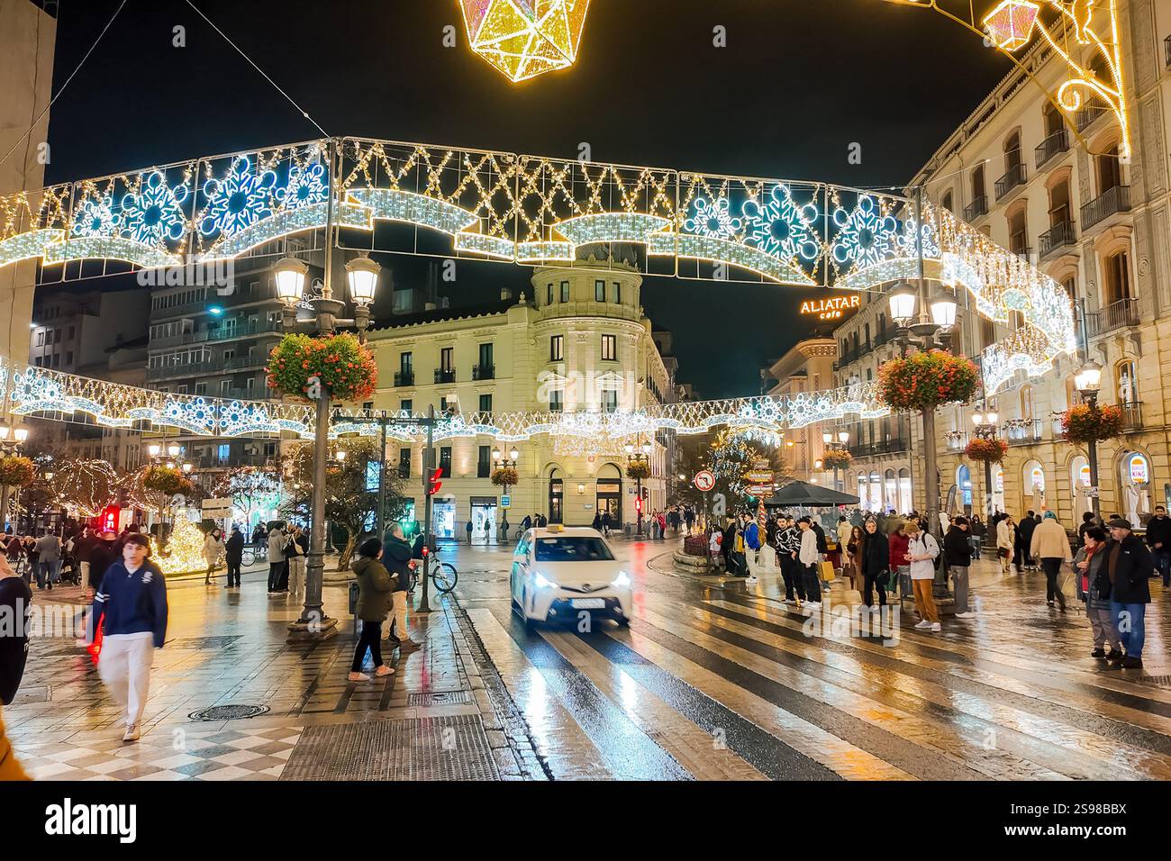 Granada at night during the Christmas season features streets filled ...