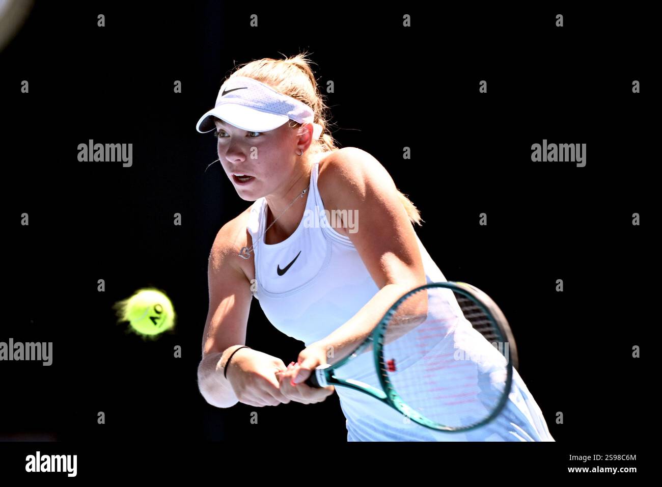 Kristina Penickova of the USA returns during her Junior Girls Singles ...