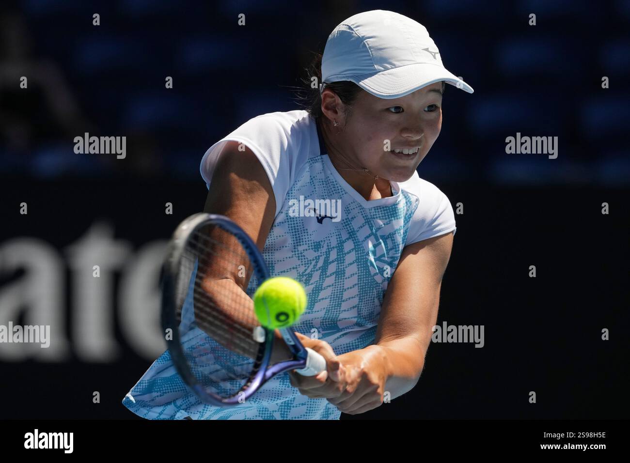 Wakana Sonobe of Japan plays a backhand return to Kristina Penickova of ...