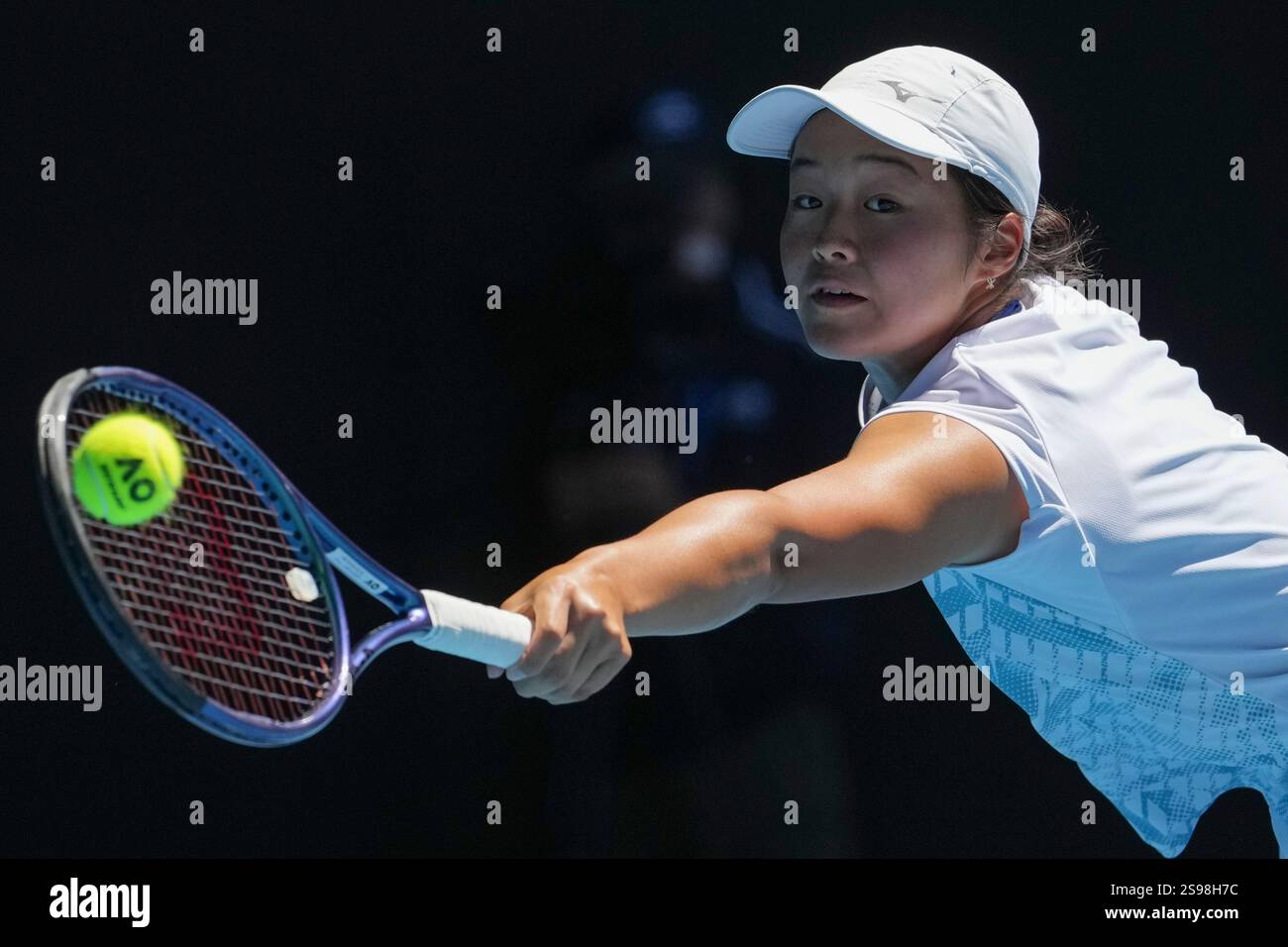 Wakana Sonobe of Japan plays a backhand return to Kristina Penickova of ...