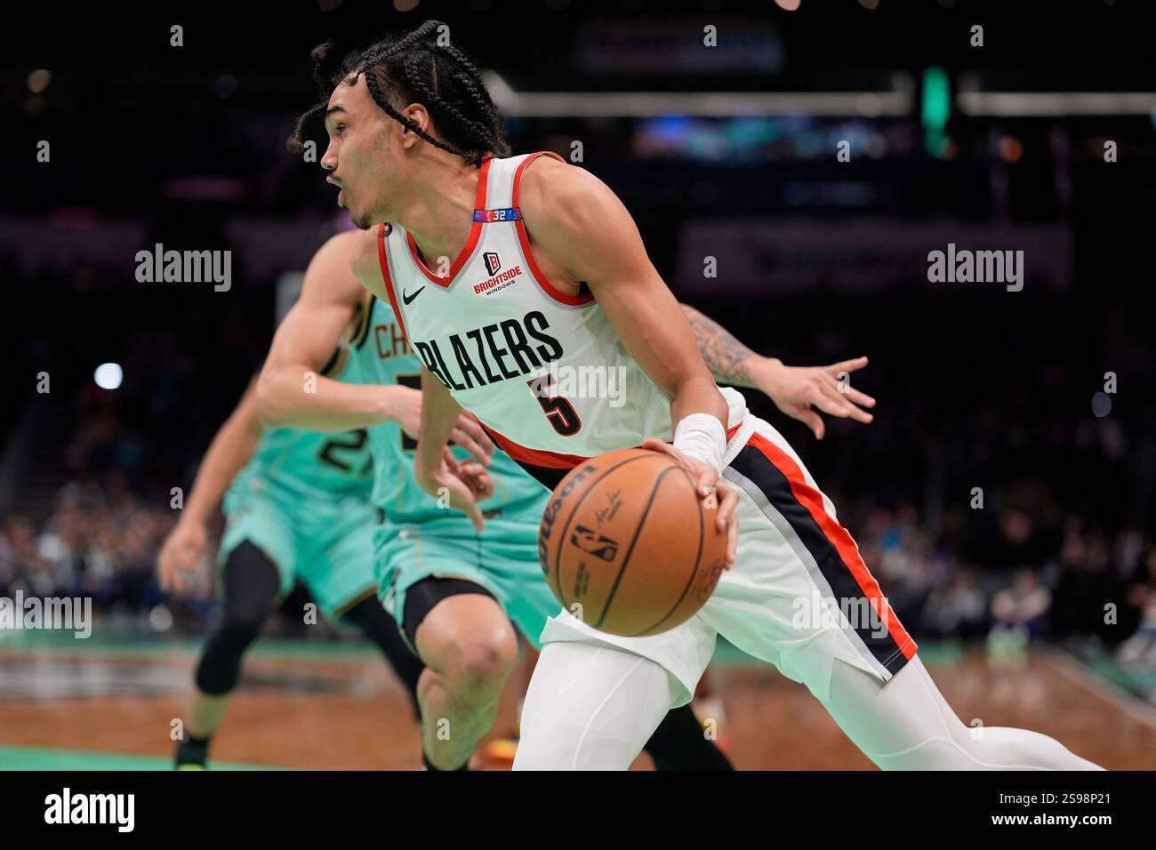 Portland Trail Blazers guard Dalano Banton (5) drives to the basket ...