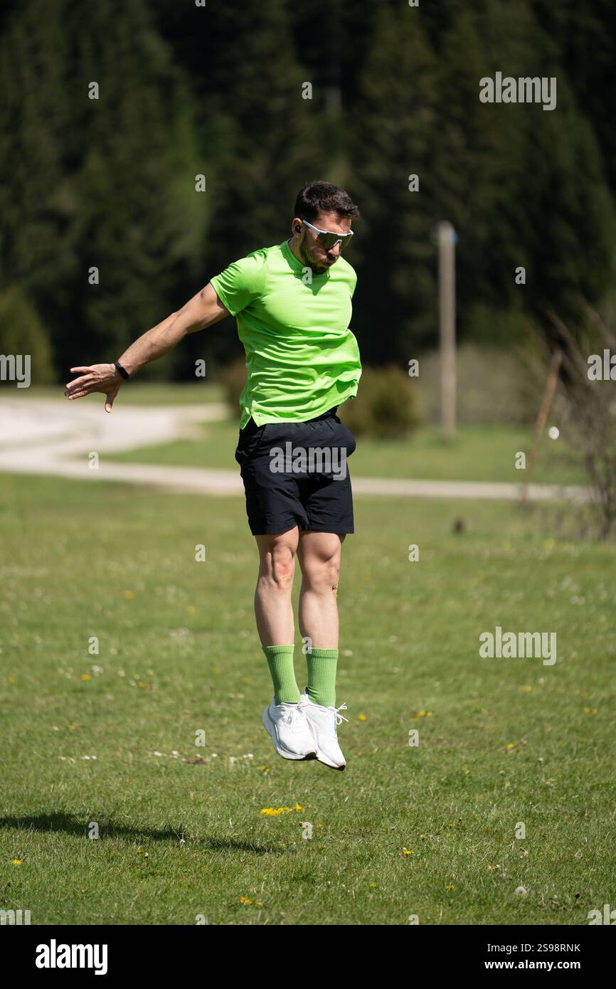 Man Jumping To His Maximum Height In Open Air Stock Photo - Alamy