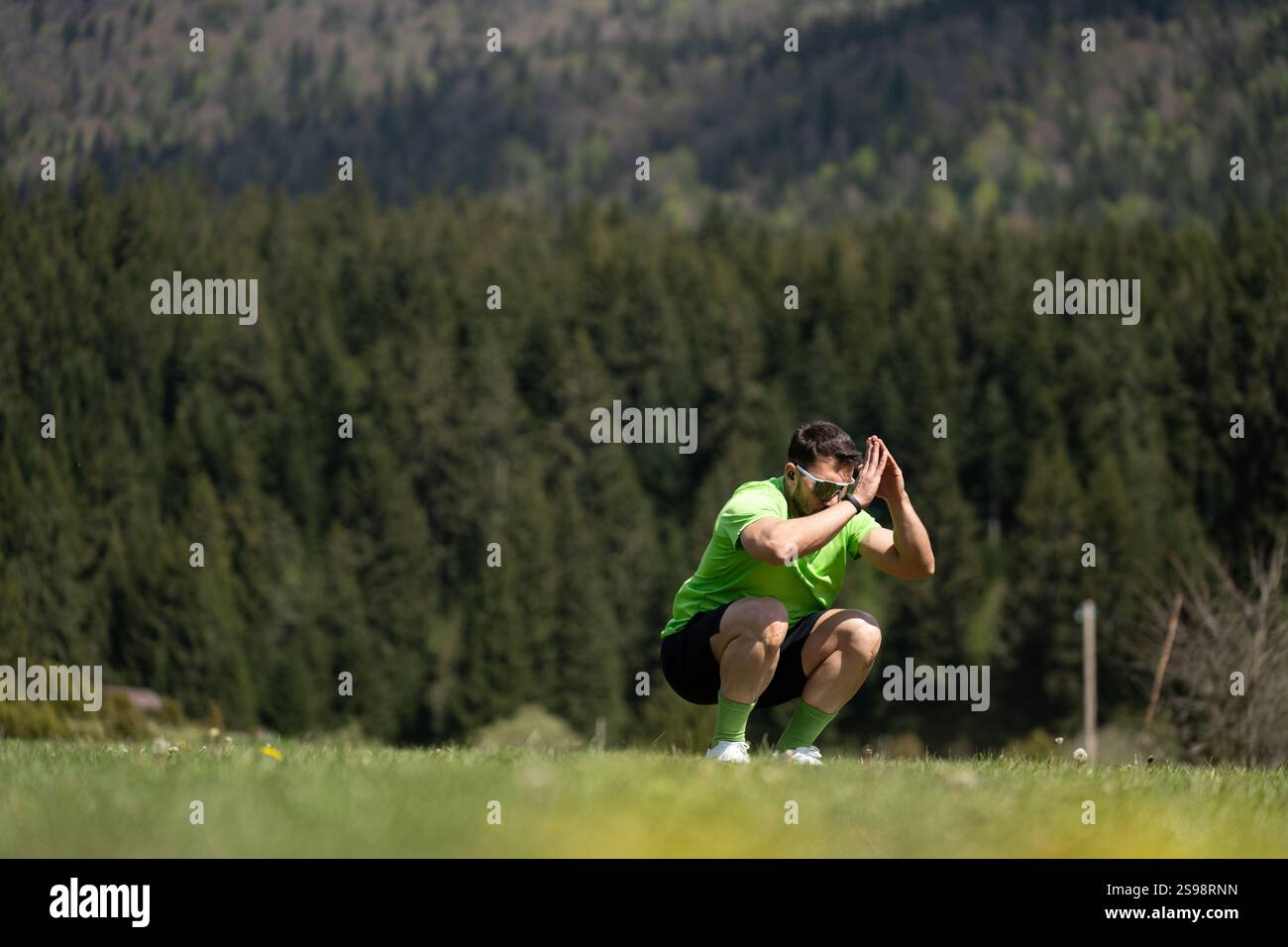 Man Jumping To His Maximum Height In Open Air Stock Photo - Alamy