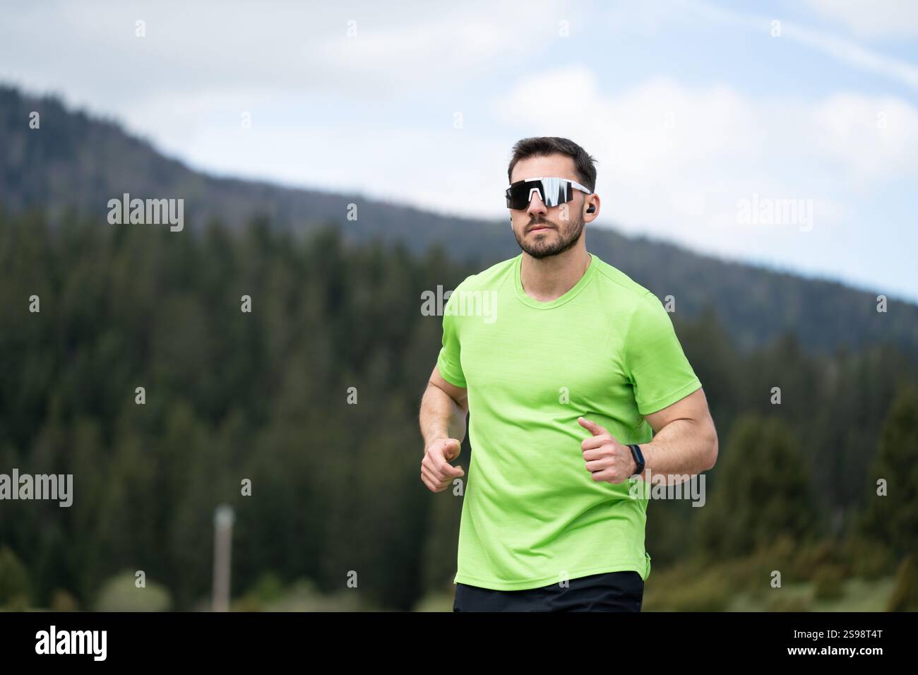 Athlete Jogging On A Sunny Outdoor Trail Designed For Walking And ...