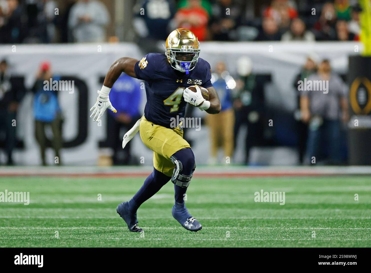 ATLANTA, GA - JANUARY 20: Notre Dame Fighting Irish running back Jeremiyah Love (4) runs with ...