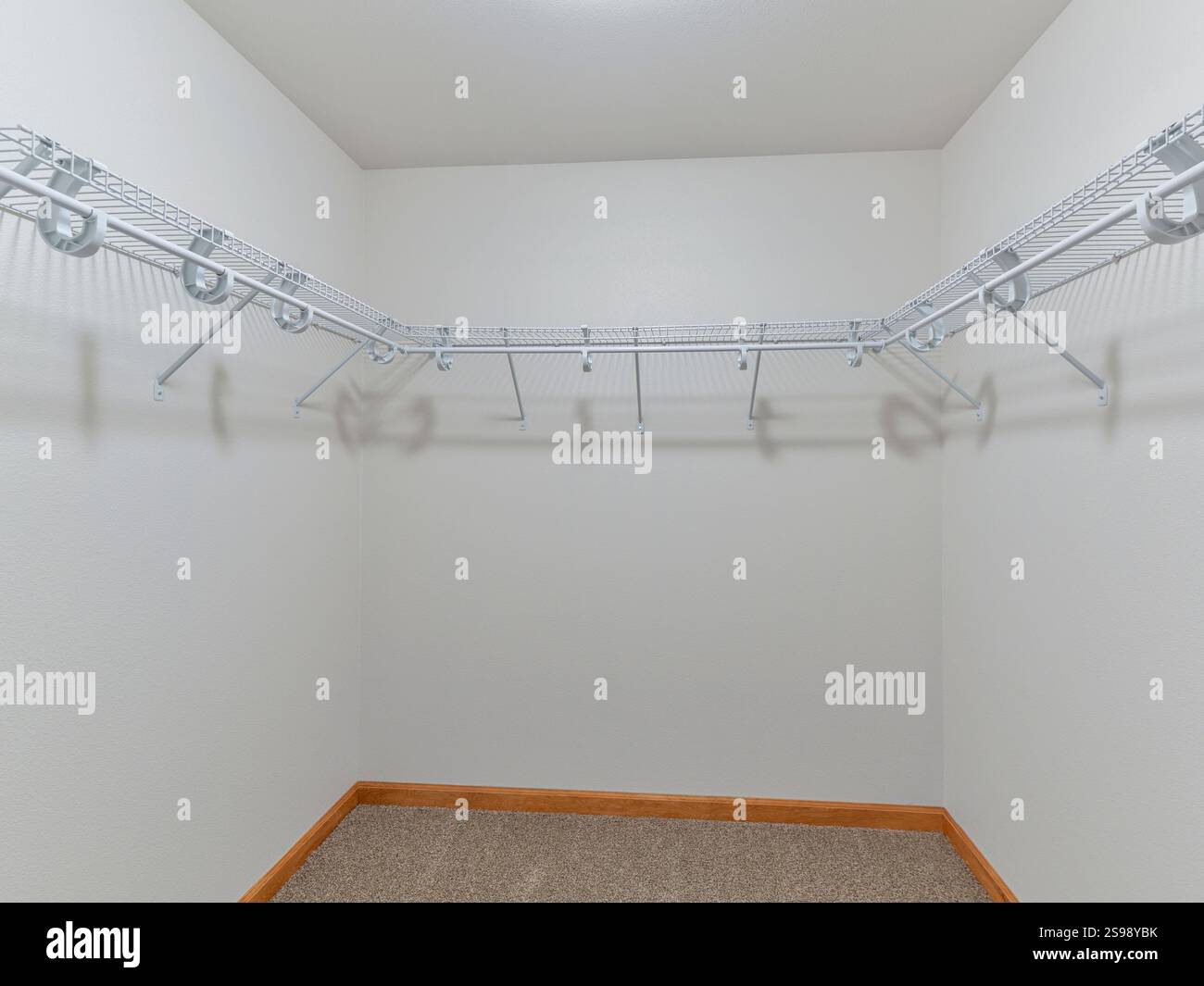 Modern residential empty bedroom closet interior Stock Photo - Alamy