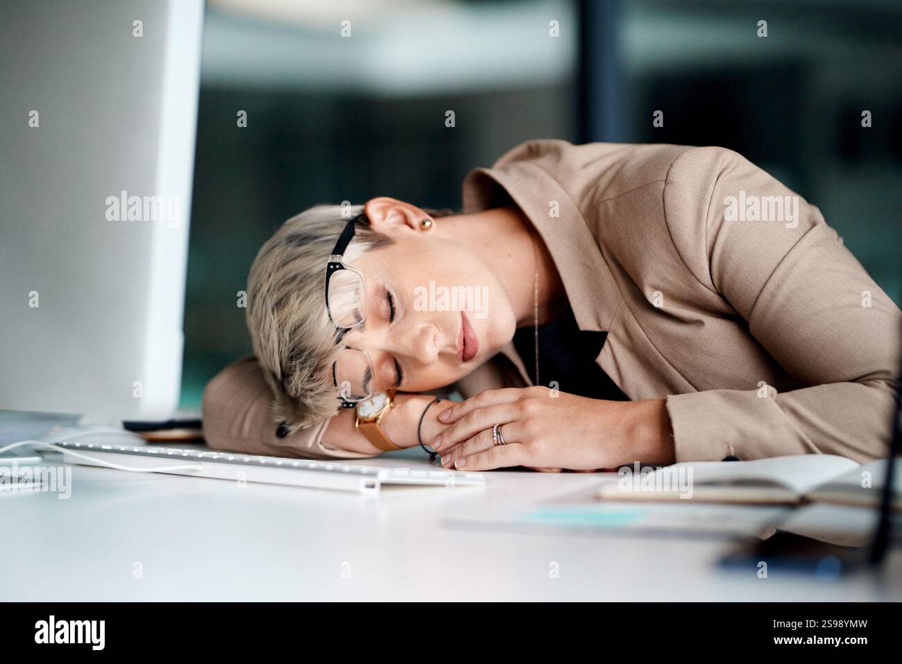 Computer, businesswoman and sleeping in office for burnout, tired and ...