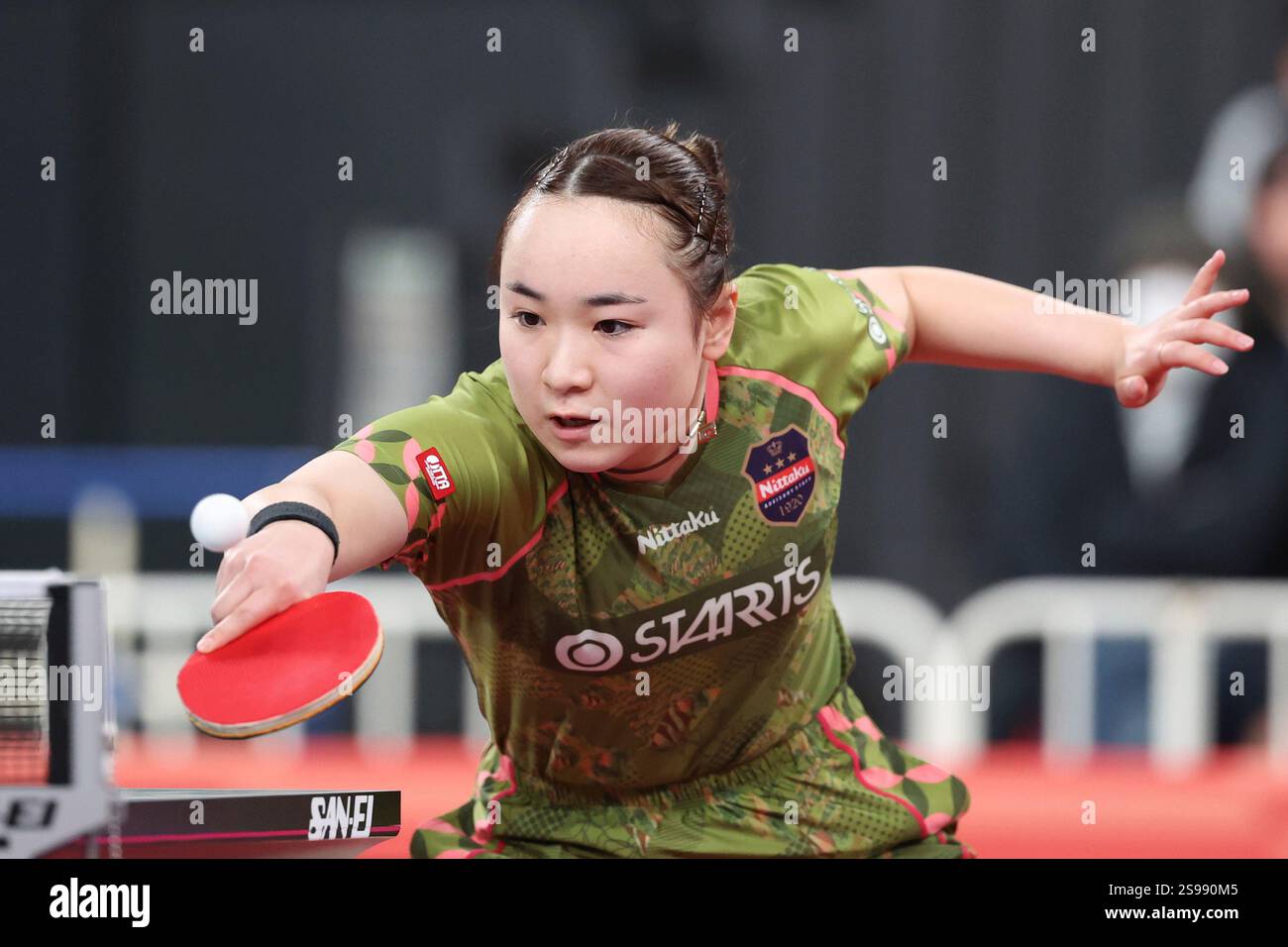 Mima Ito hits a ball during the women's singles quarterfinals against ...