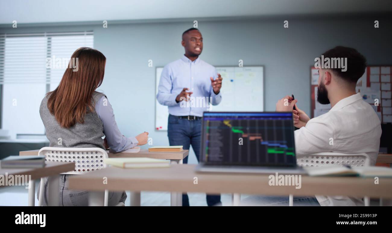 Teacher In Classroom Lesson. High School Education Stock Photo - Alamy