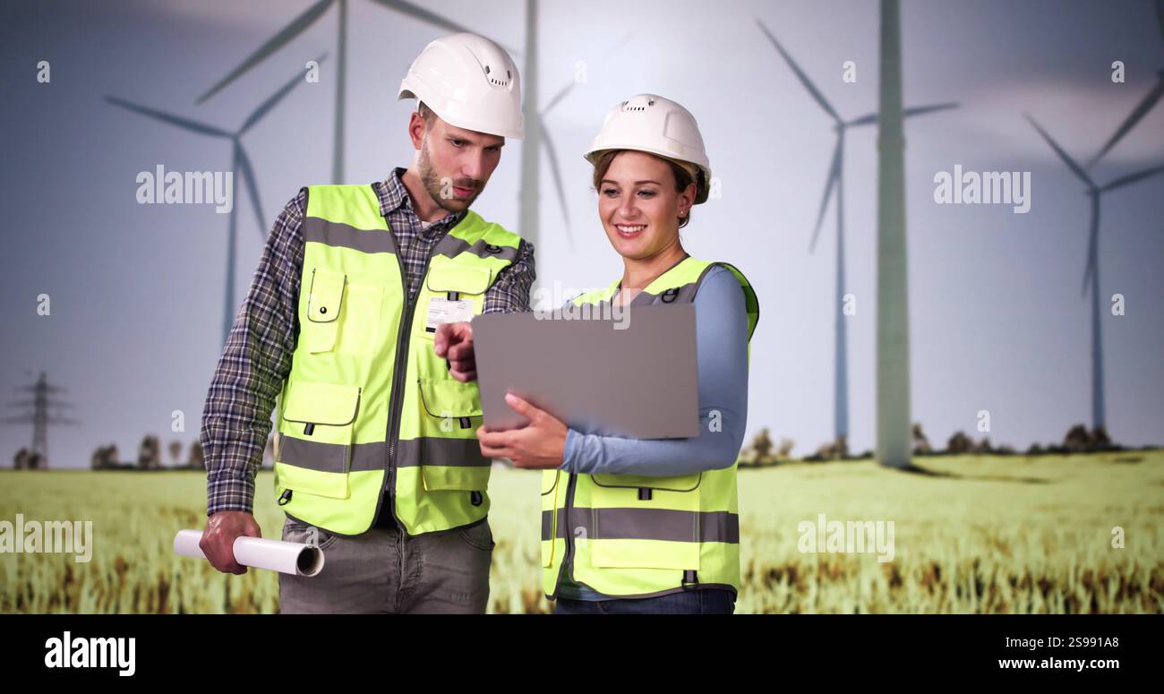 Wind Energy Worker Engineers With Laptop. Renewable Power Industry ...