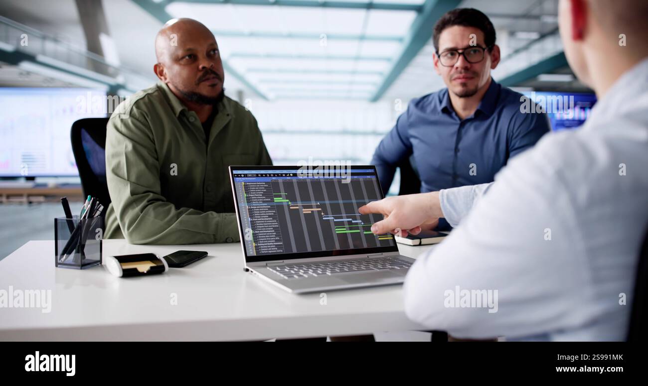 Young Black Programmer Coding On Laptop At Office Late Night Stock ...
