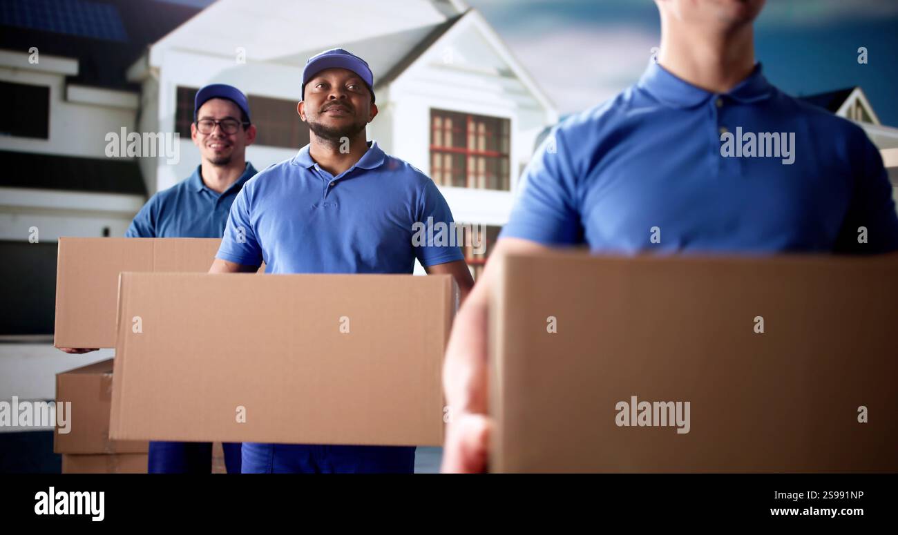 Professional Mover Smiling While Loading Boxes Into Moving Truck Stock ...