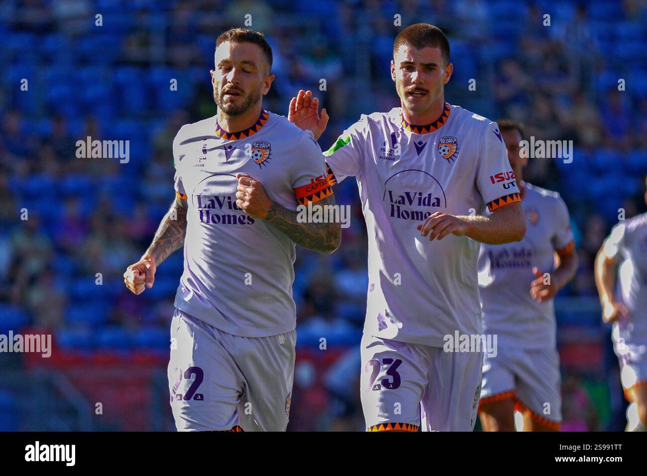 Adam Taggart of Glory celebrates with Patrick Wood of Glory after ...