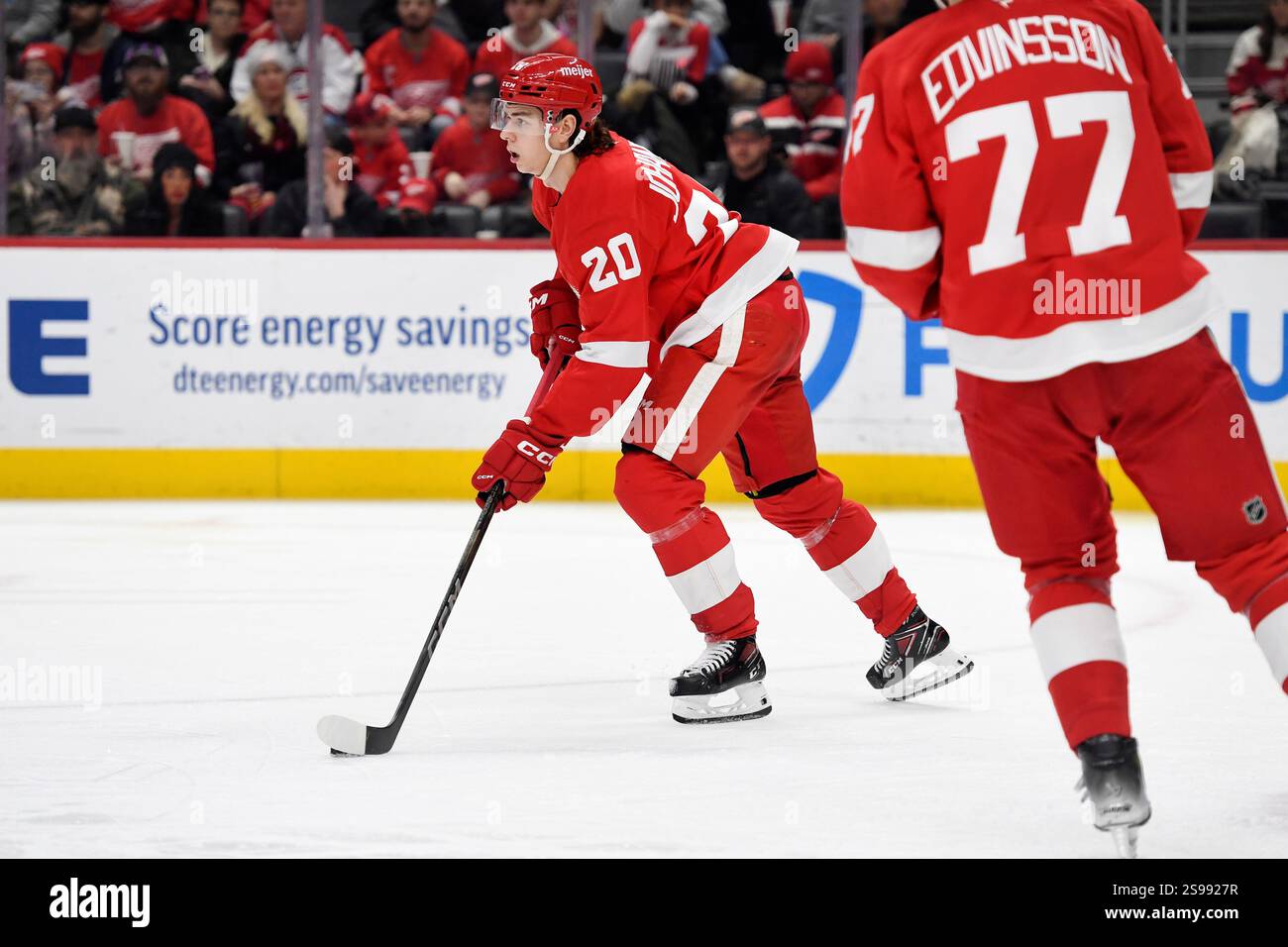 Detroit Red Wings defenseman Albert Johansson (20) skates with the puck ...